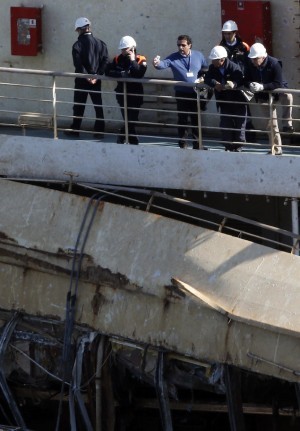 PHOTOS: Disgraced Captain Francesco Schettino Returns to Costa Concordia