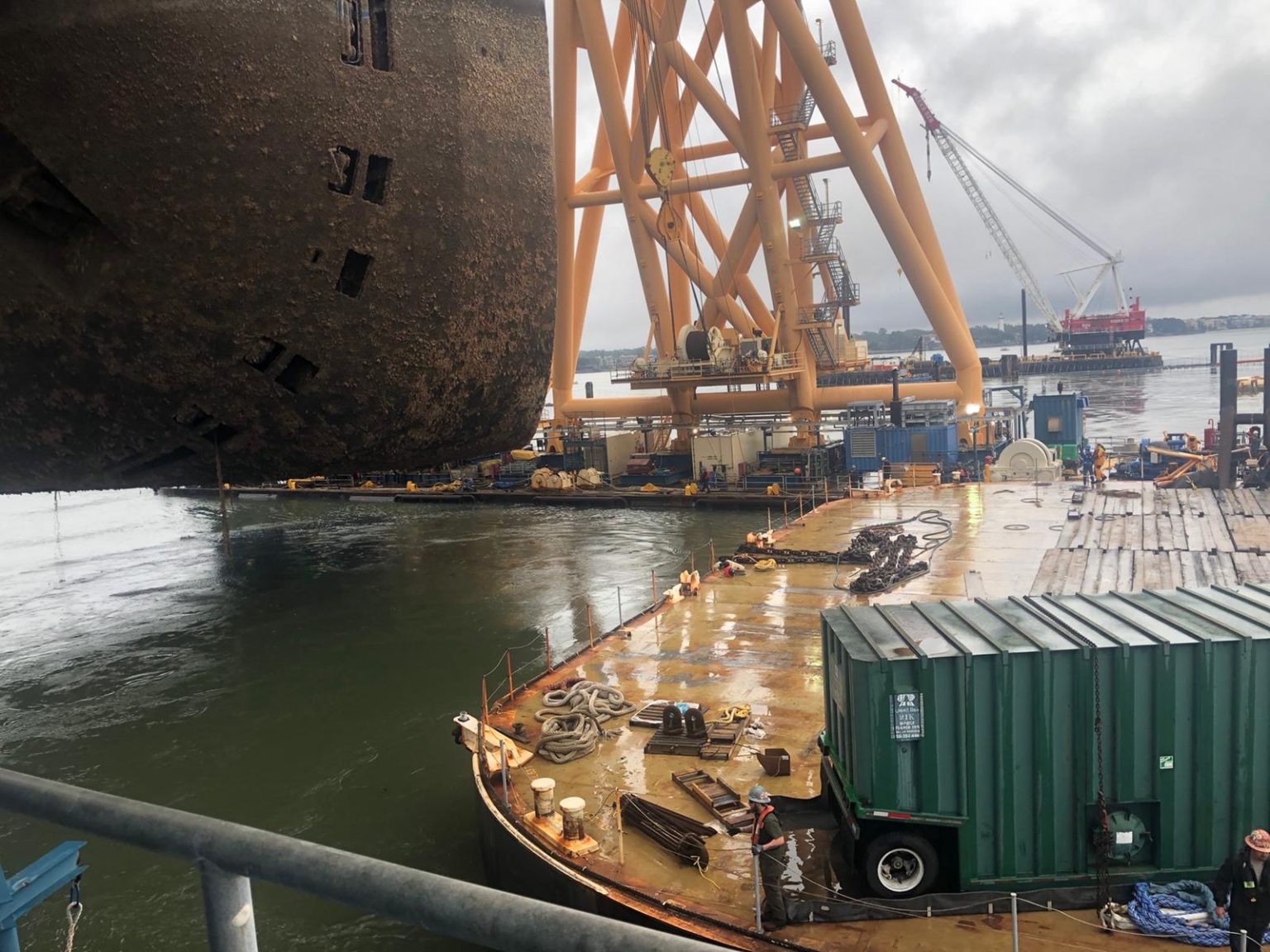 Photos: Section One of Golden Ray Wreck Cut and Lifted Onto Barge