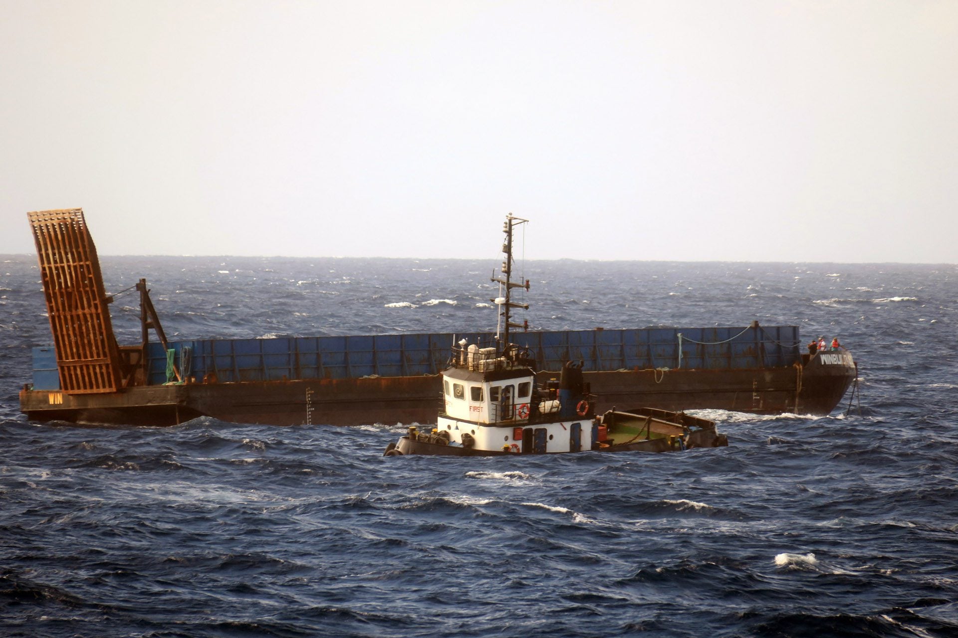 Royal Navy Rescues Five from Sinking Tug in the Caribbean